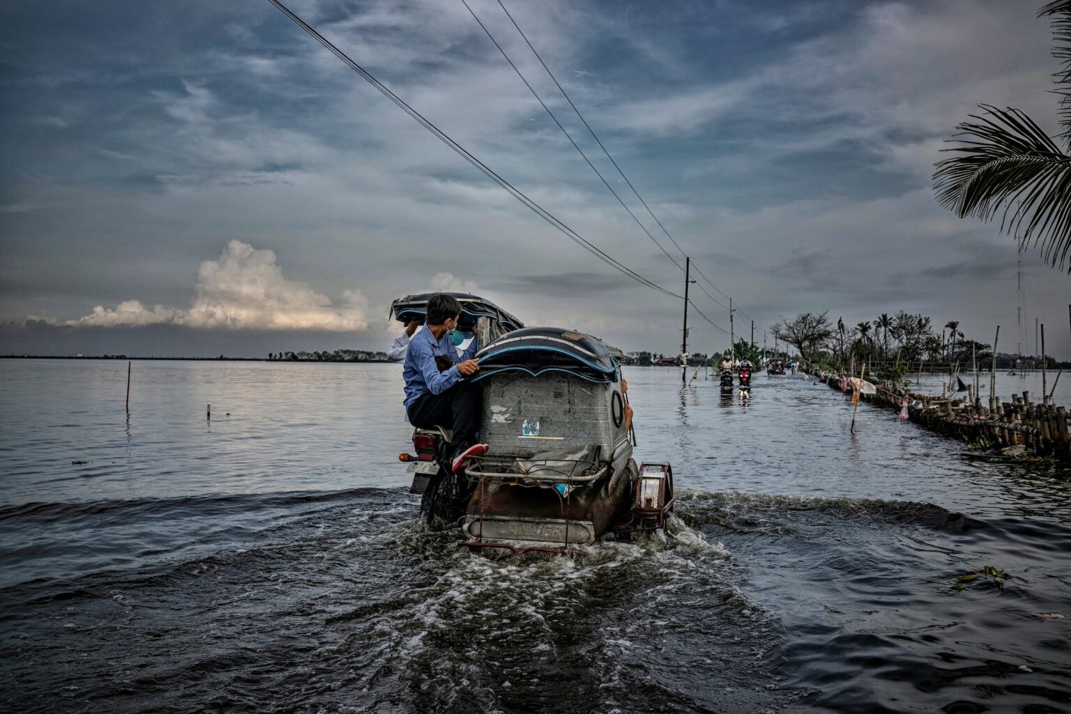 Sinking Land and Rising Seas Threaten Manila Bay’s Coastal Communities ...