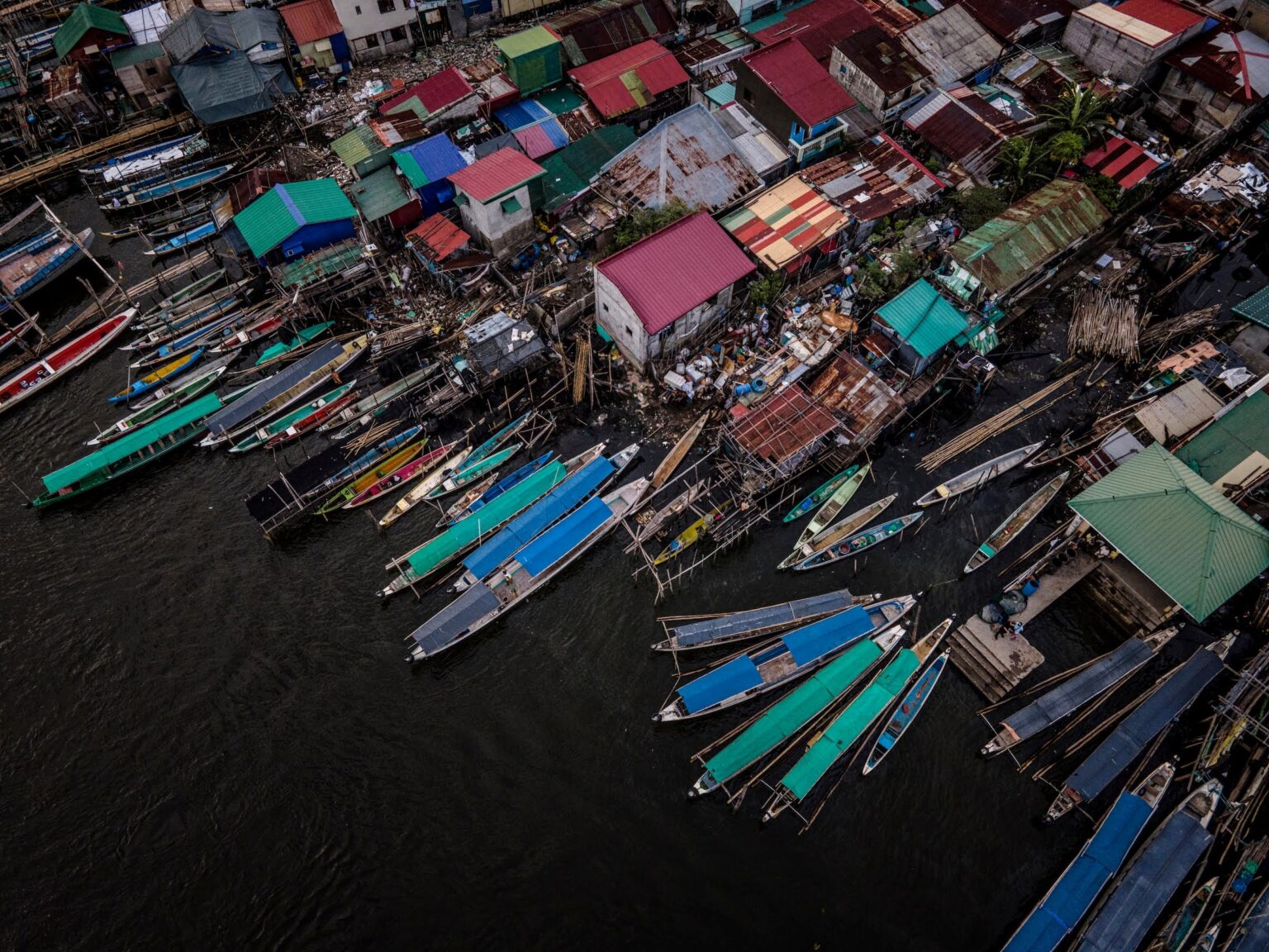 Sinking Land and Rising Seas Threaten Manila Bay’s Coastal Communities ...