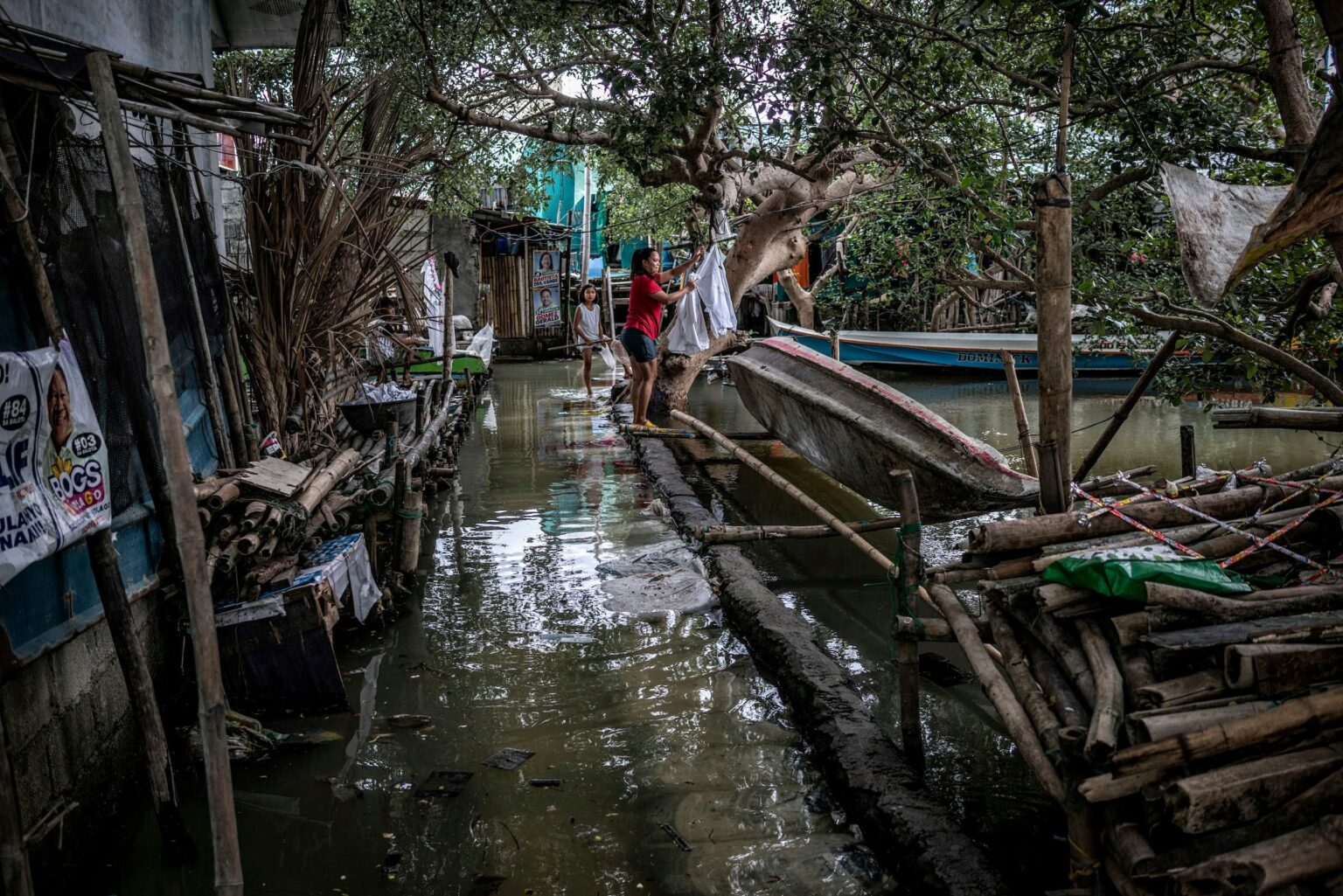 Sinking Land and Rising Seas Threaten Manila Bay’s Coastal Communities ...