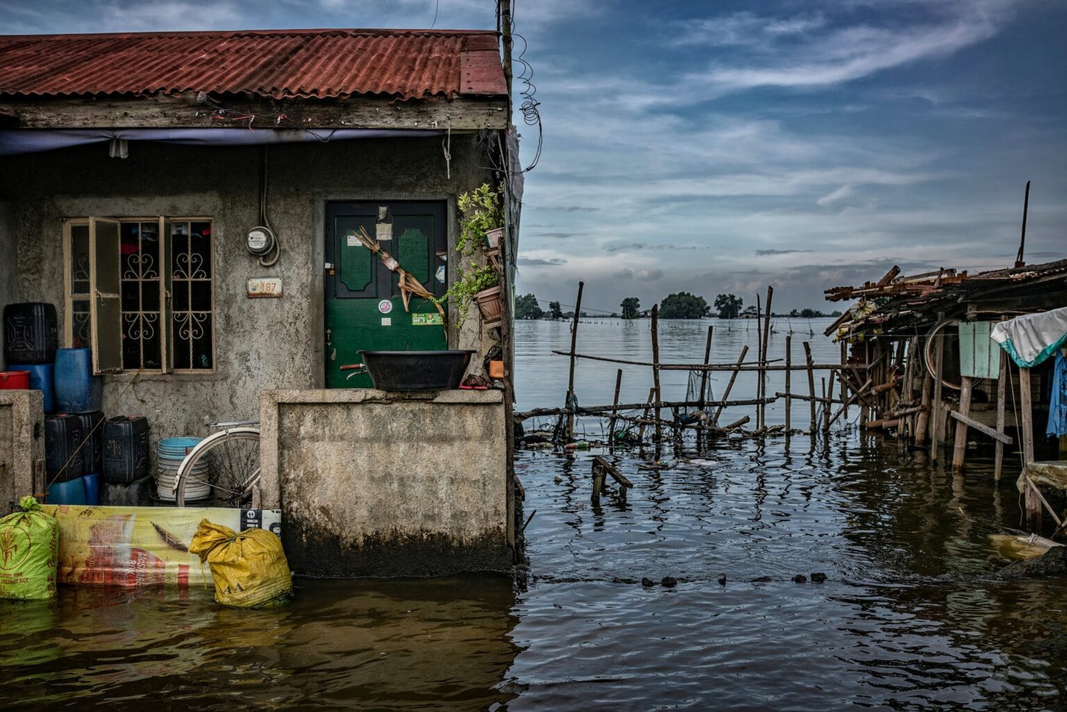 Sinking Land and Rising Seas Threaten Manila Bay’s Coastal Communities ...